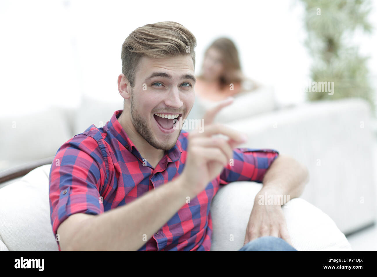 closeup of happy young man showing forward Stock Photo - Alamy