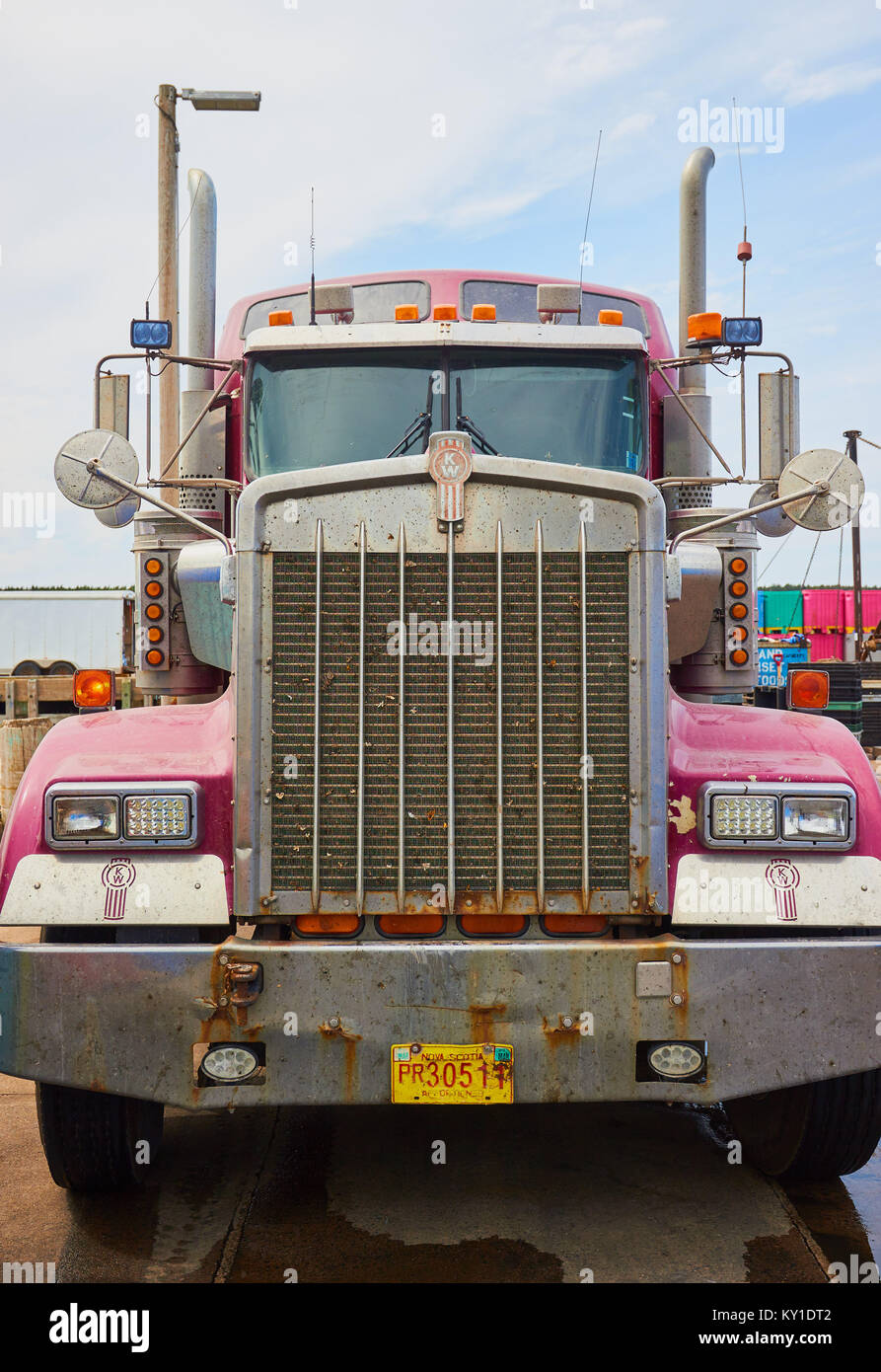 Giant pink Kenworth truck parked on the quay, Cheticamp, Cape Breton ...