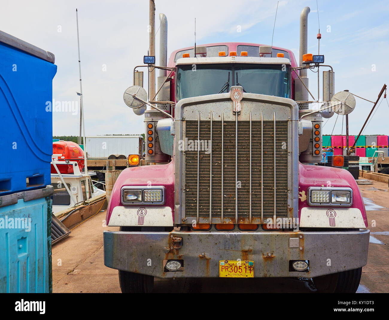Giant pink Kenworth truck parked on the quay, Cheticamp, Cape Breton ...