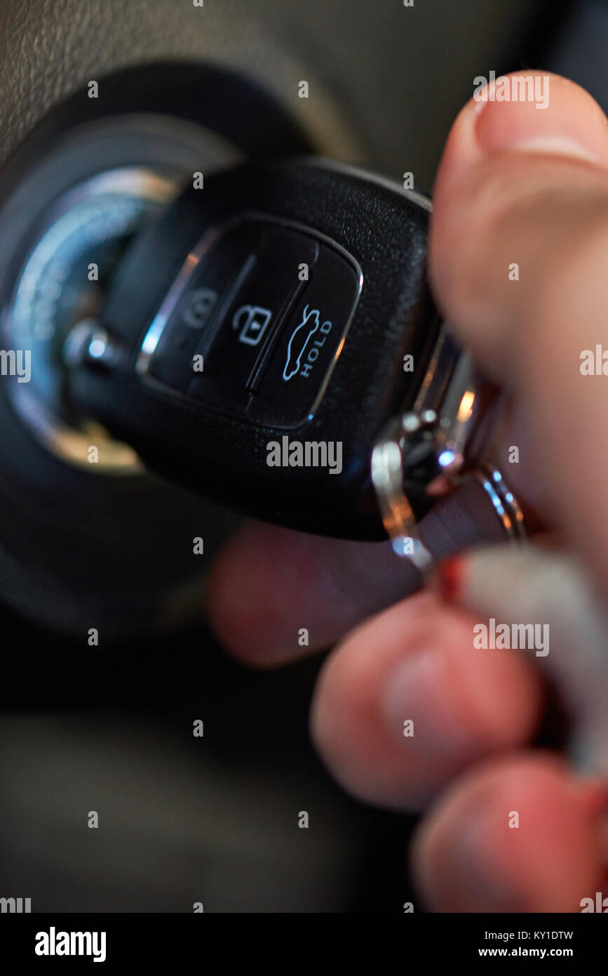 Close-up of car ignition. Man start modern car Stock Photo - Alamy