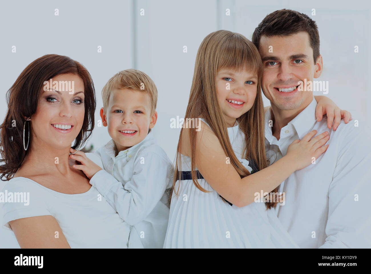Beautiful happy family - isolated over a white background Stock Photo ...