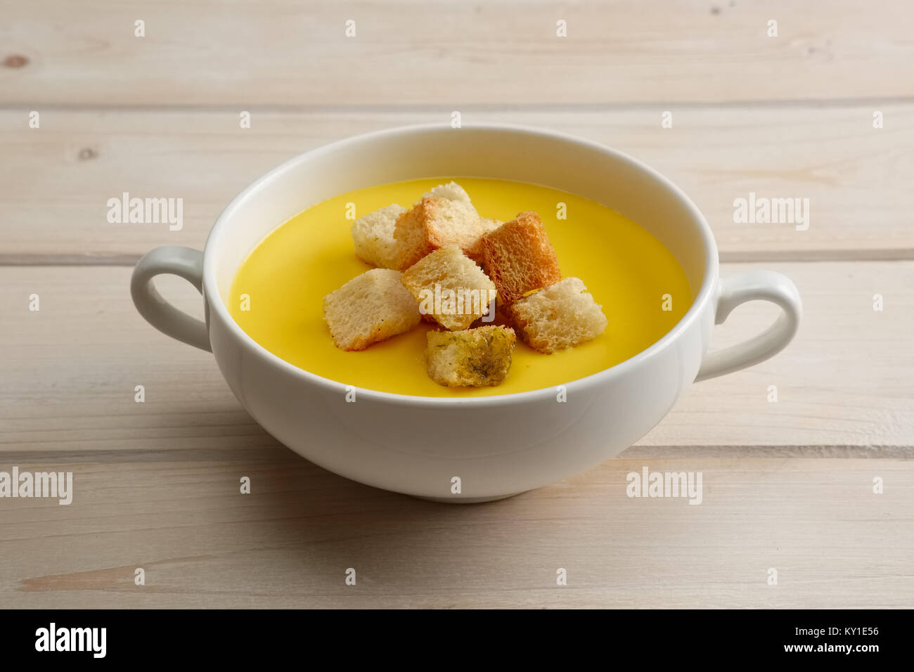 Chicken soup puree with white bread chips Stock Photo - Alamy
