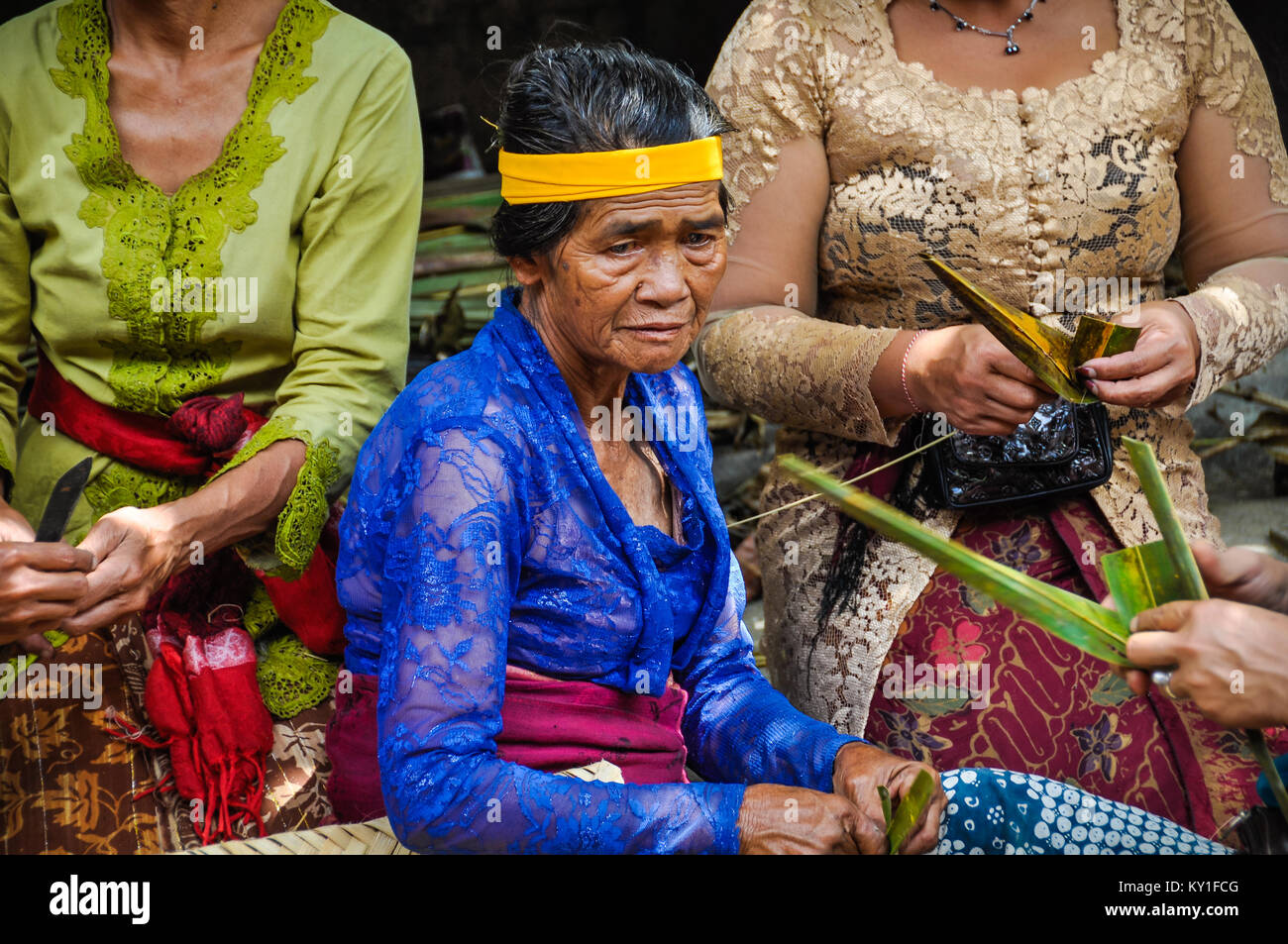 Balinese woman in the Tirta Empul Temple in Bali, Indonesia Stock Photo ...