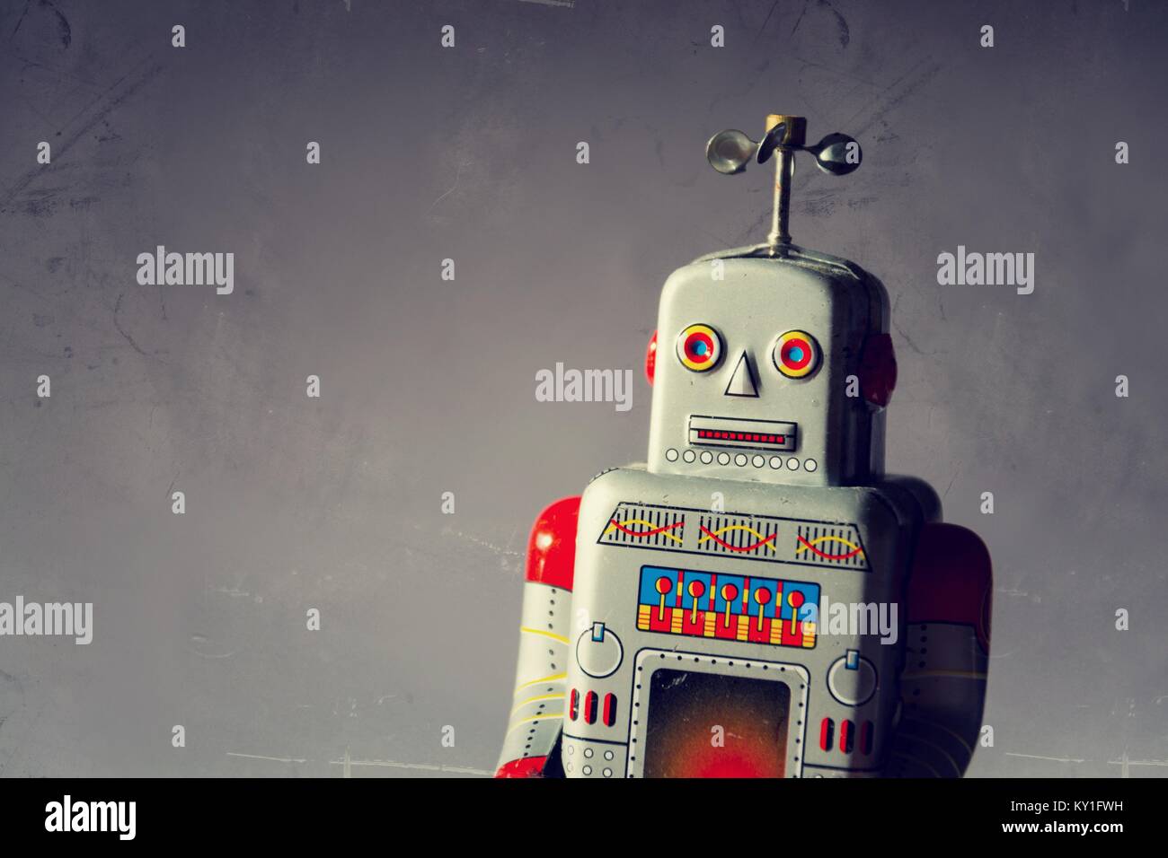 Vintage tin toy robot isolated, drone delivery artificial intelligence ...