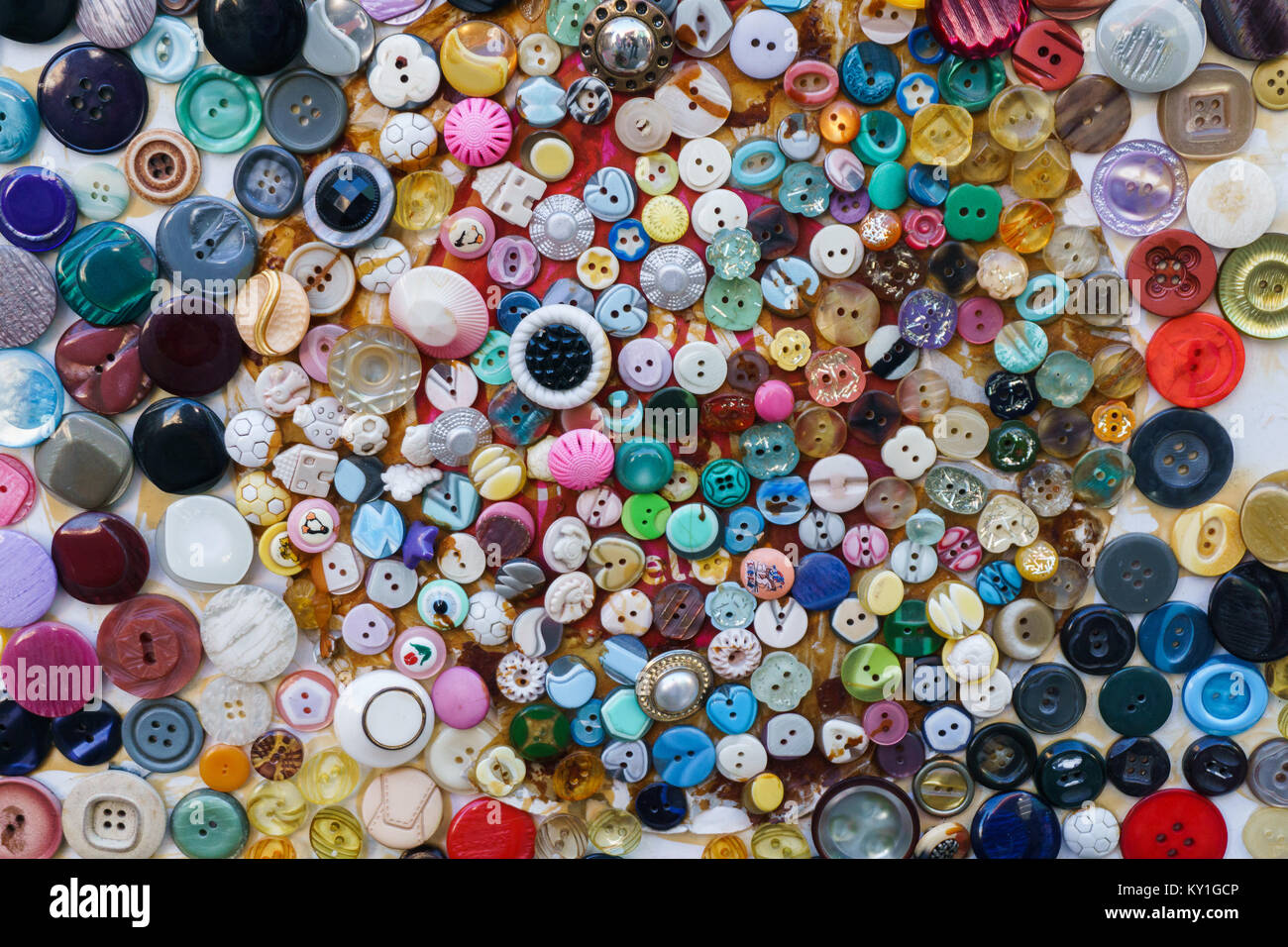 Image on top of many many-colored buttons Stock Photo - Alamy