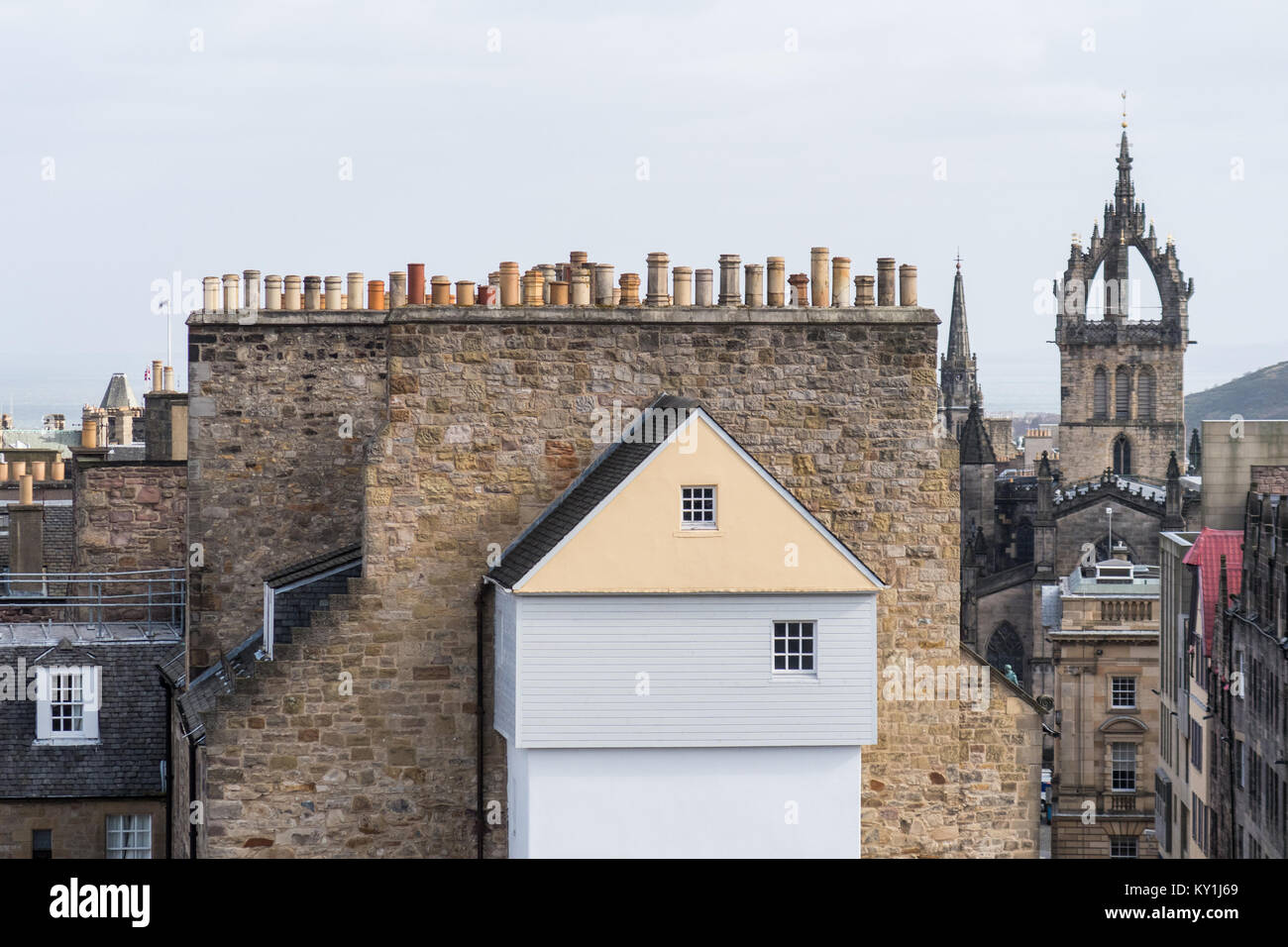 Chimney pots of varying sizes and colours on the Edinburgh skyline ...