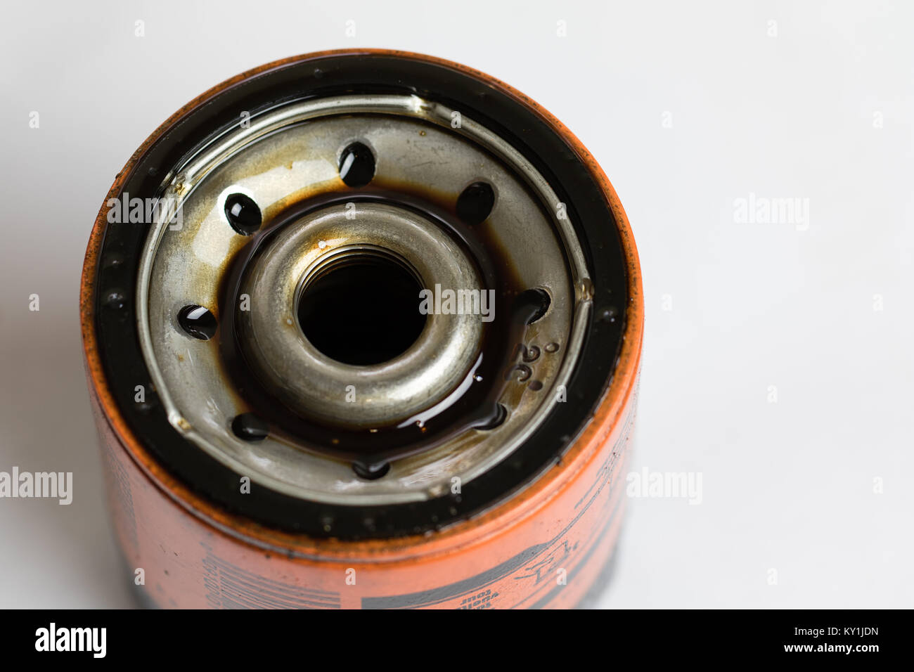 used automotive oil filter with oil stains Stock Photo - Alamy