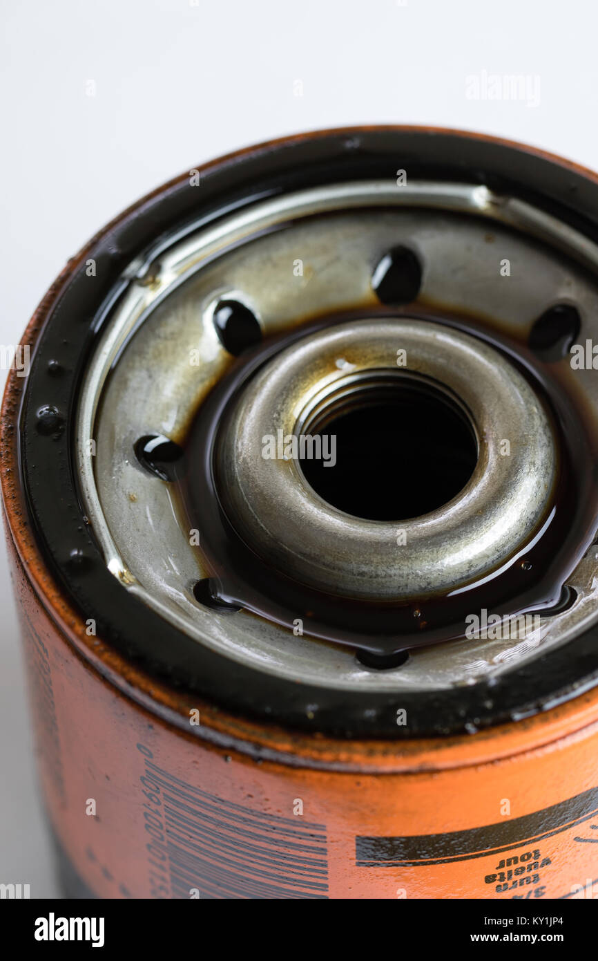 used automotive oil filter with oil stains Stock Photo - Alamy
