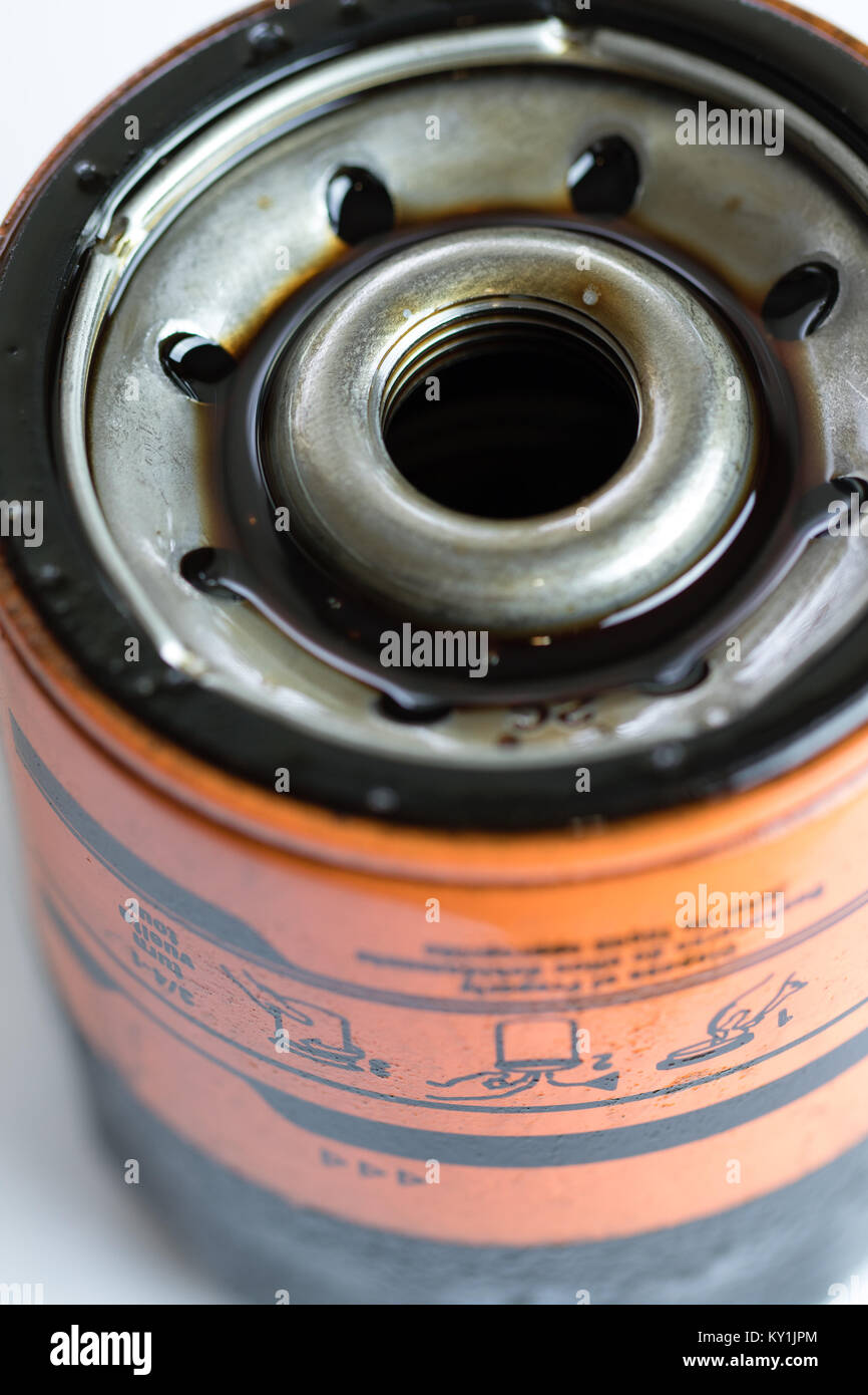 used automotive oil filter with oil stains Stock Photo - Alamy