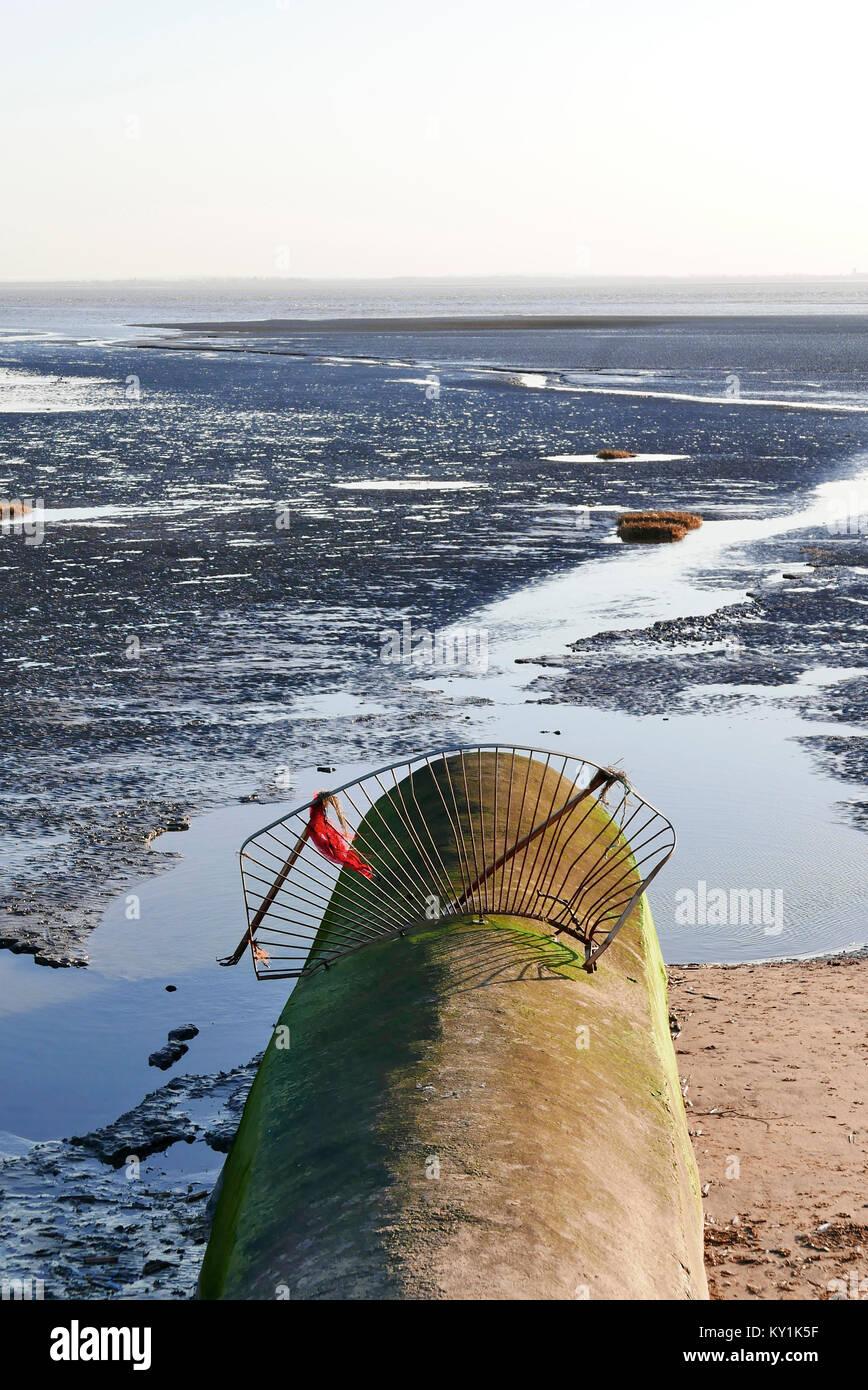 Outlet pipe from above showing snagged material attached to the top ...