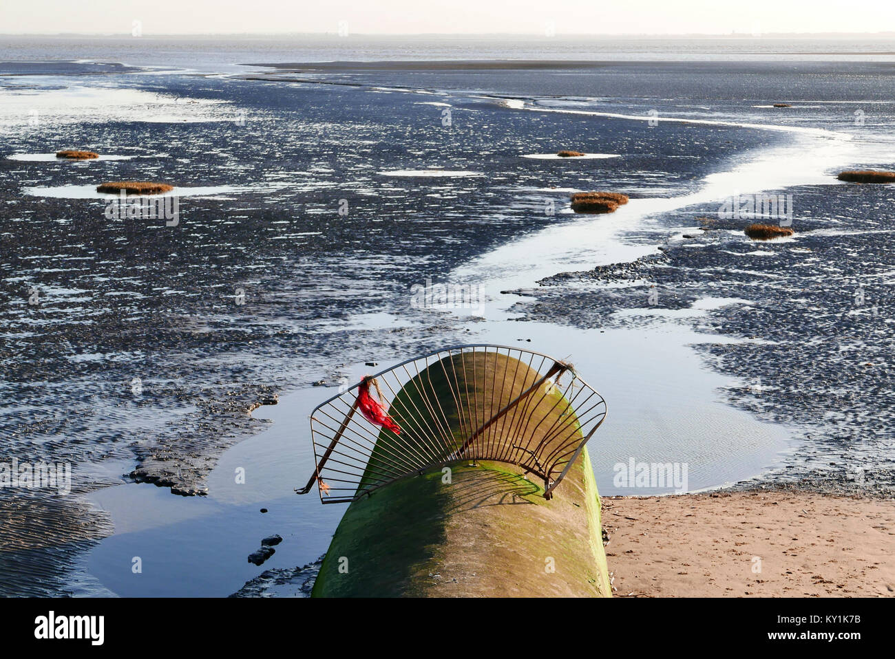Outlet pipe from above showing snagged material attached to the top ...