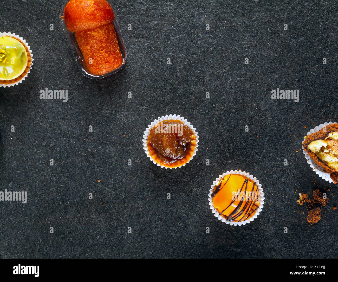 Italian Neapolitan sweets on a black stone background Stock Photo - Alamy