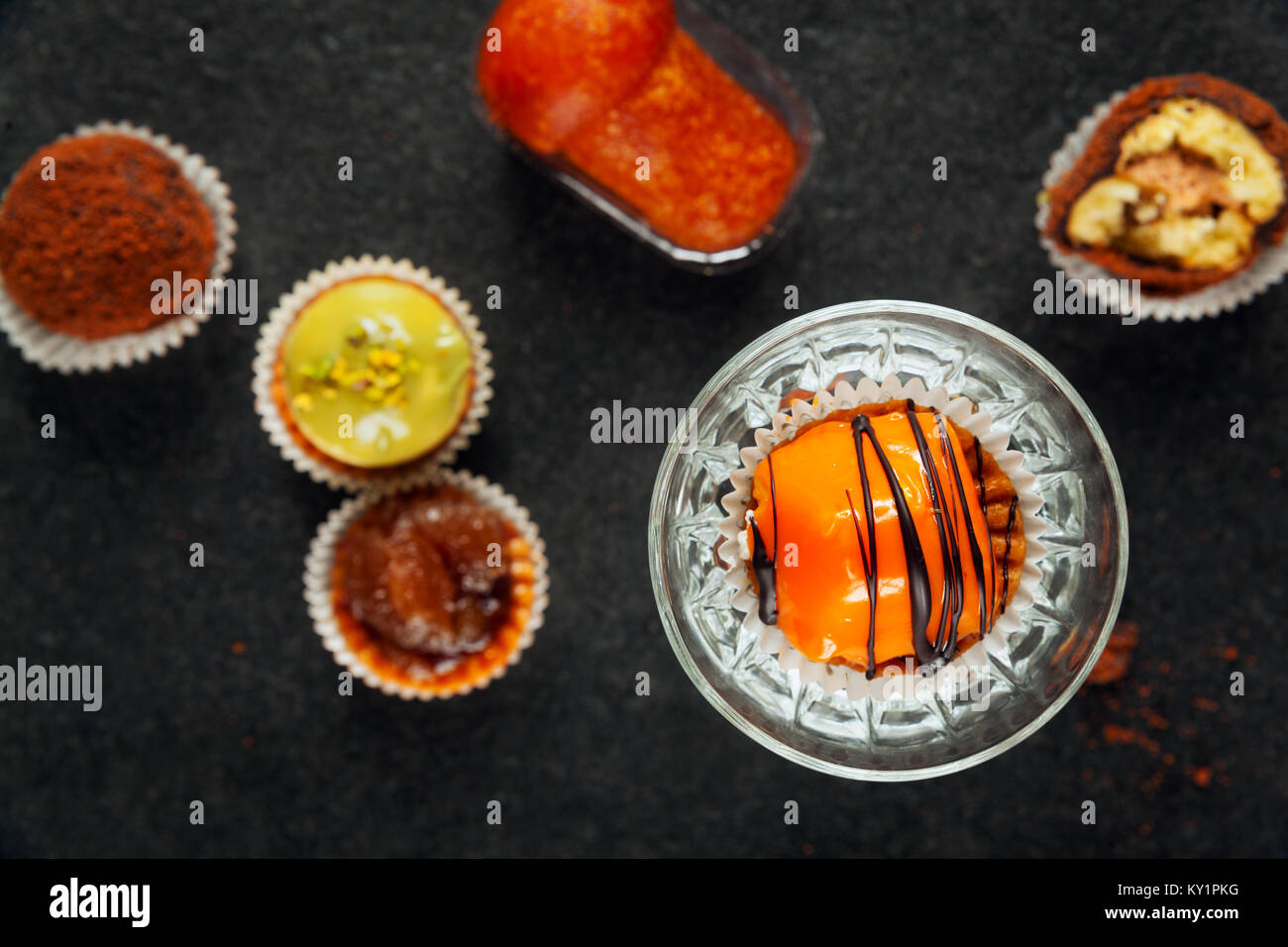 Italian Neapolitan sweets on a black stone background Stock Photo - Alamy