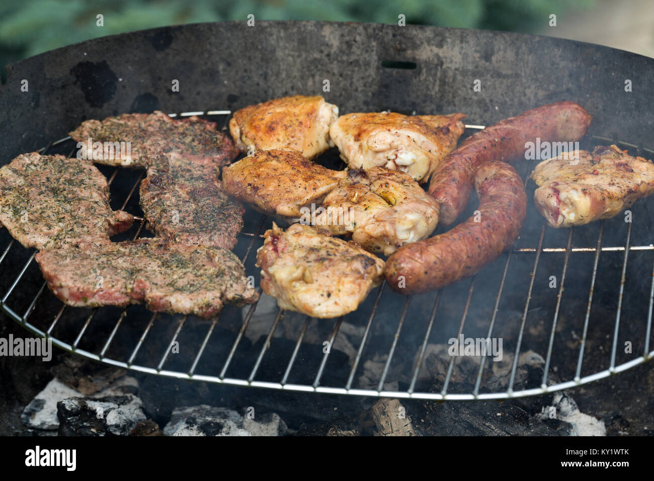 barbecue with delicious grilled meat on grill Stock Photo - Alamy