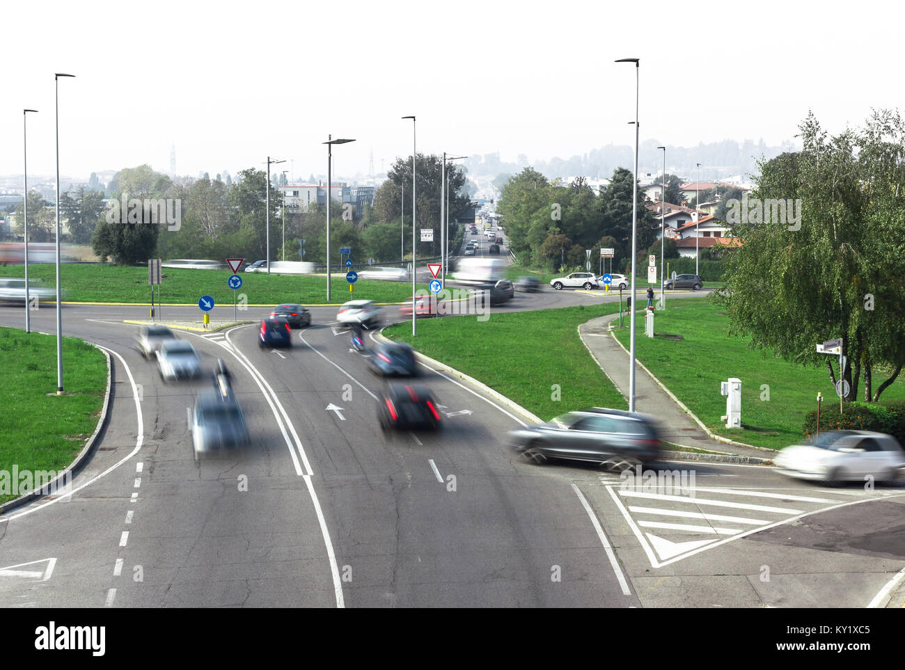 Car traffic around the roundabout Stock Photo - Alamy