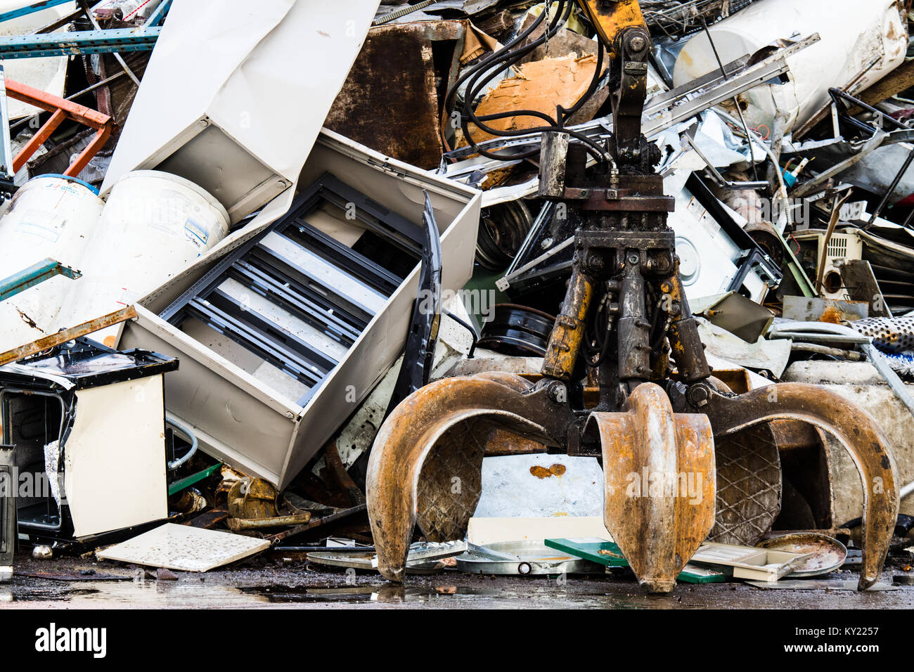 Powerful mechanical grabbing arm is the force that moves old scrap ...