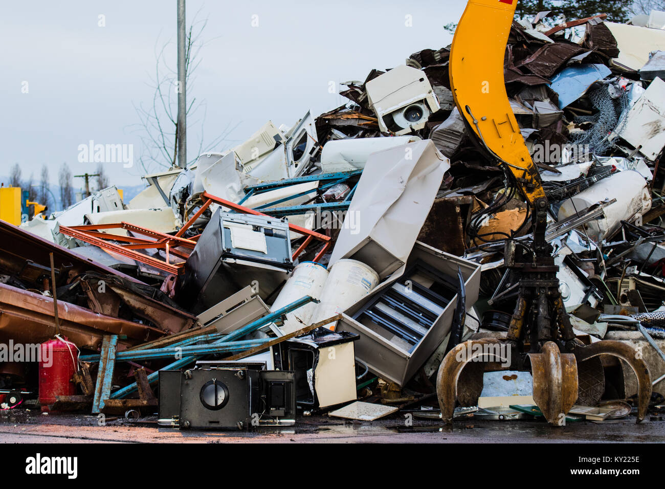 Powerful mechanical grabbing arm is the force that moves old scrap ...