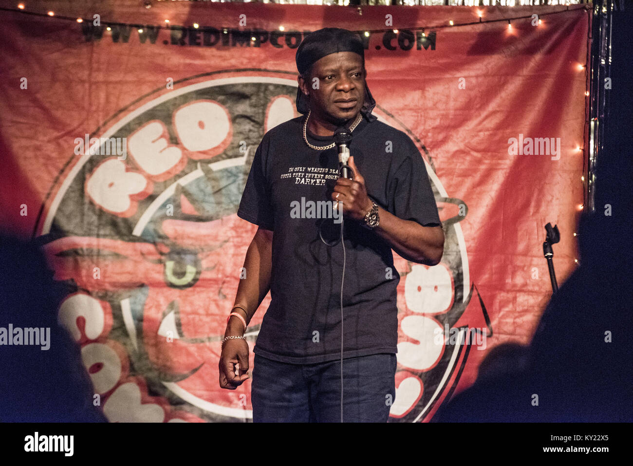 Comedian stephen k amos performing portraits the red imp comedy hi-res ...