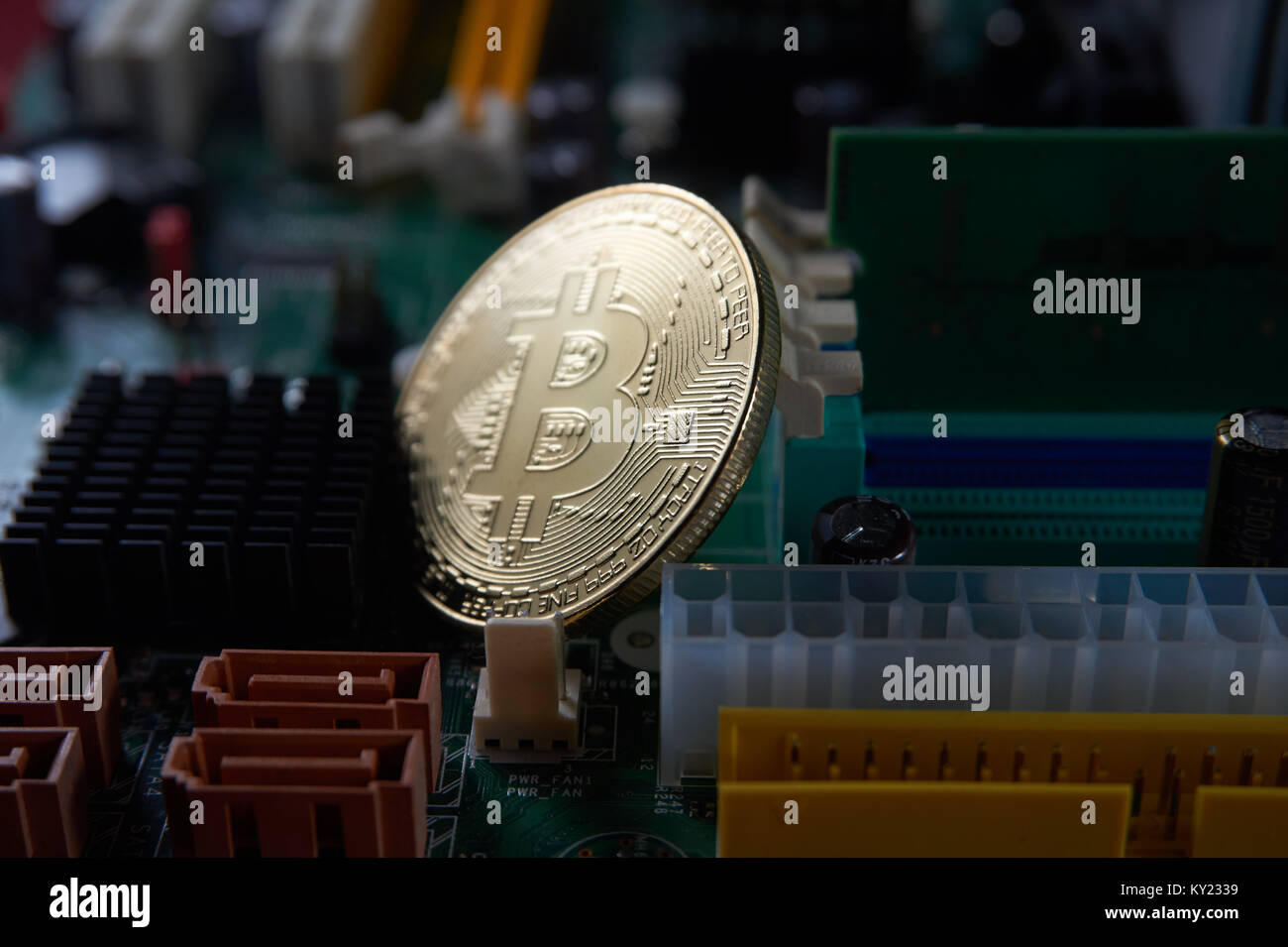 Bitcoin on computer motherboard Stock Photo - Alamy