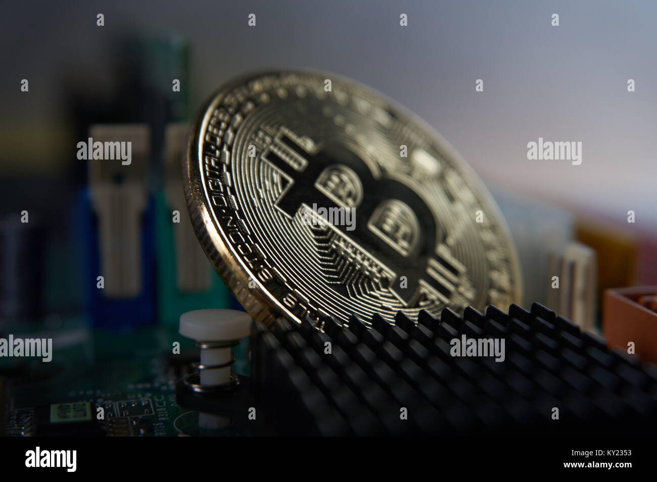 Bitcoin on motherboard Stock Photo - Alamy