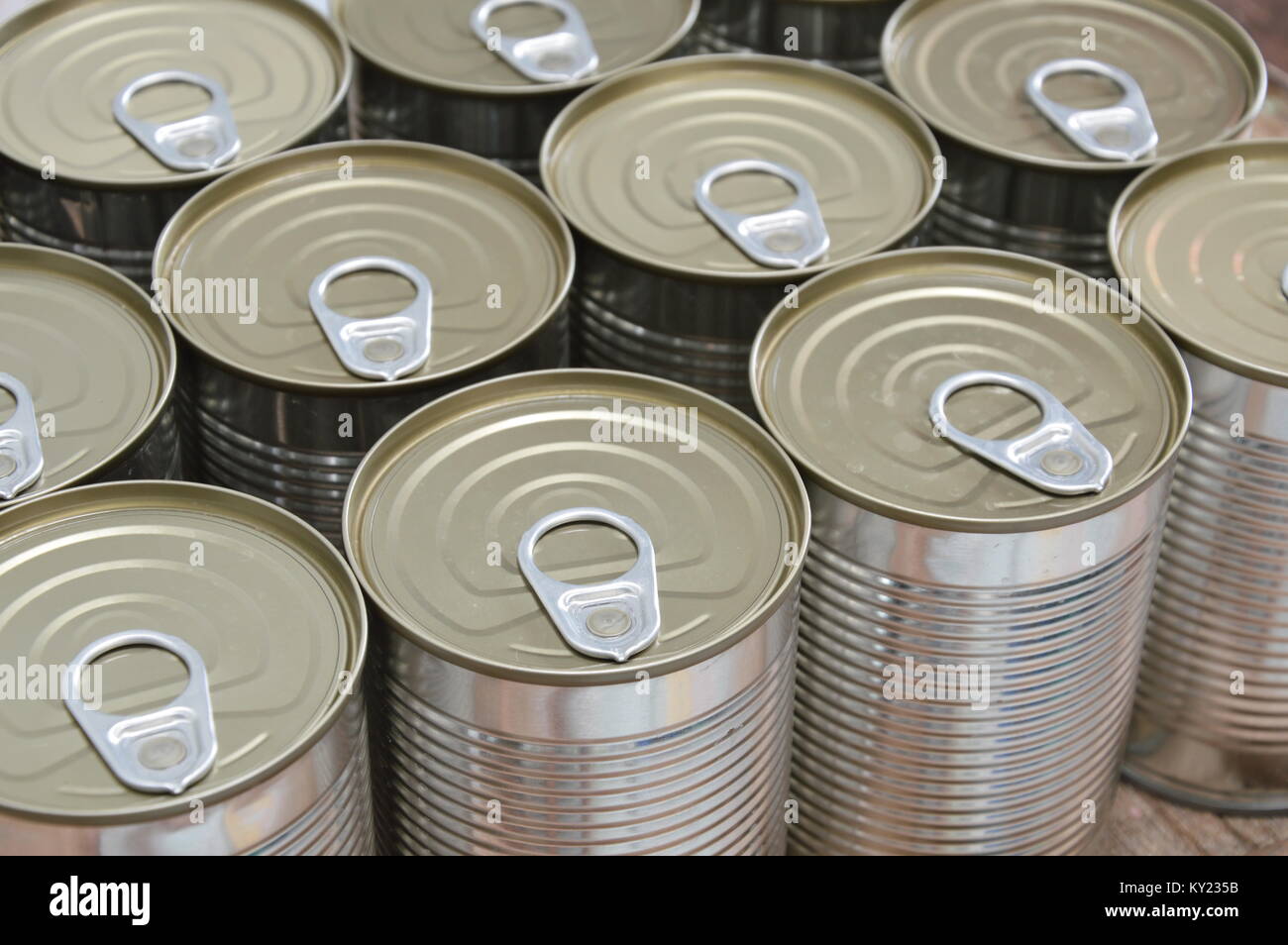 tin can food on wooden board Stock Photo - Alamy