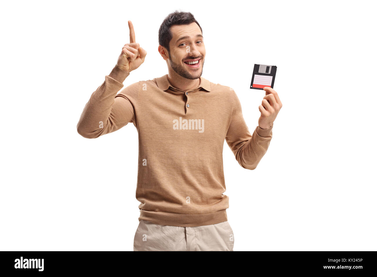 Young man with a floppy disk holding his index finger up isolated on ...