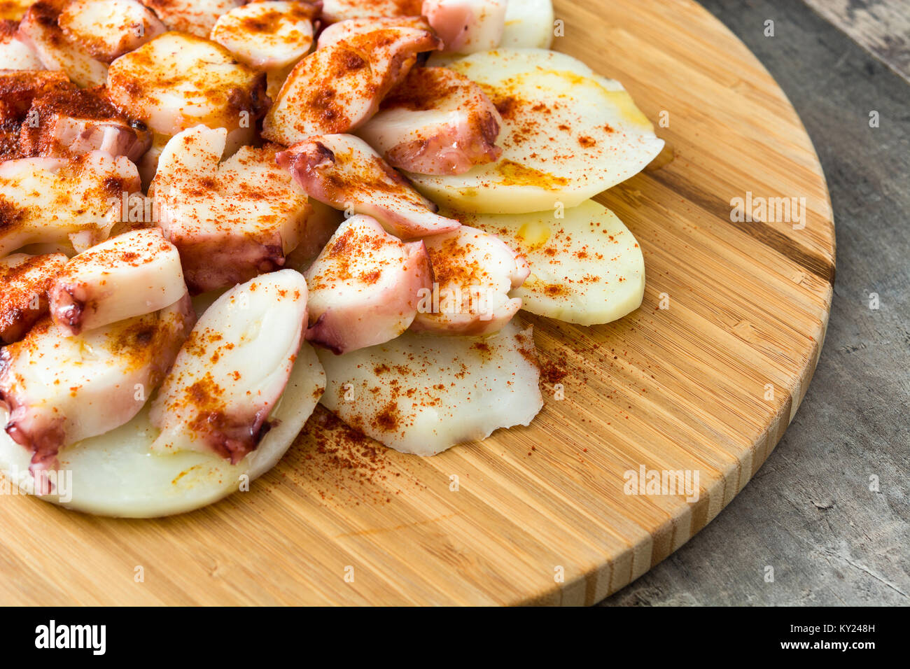 Pulpo a la gallega. Galician octopus on wood. Typical spanish food ...