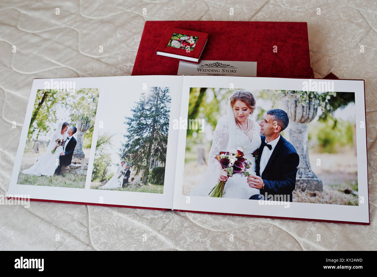 Pages of red wedding photobook or wedding album on white background ...
