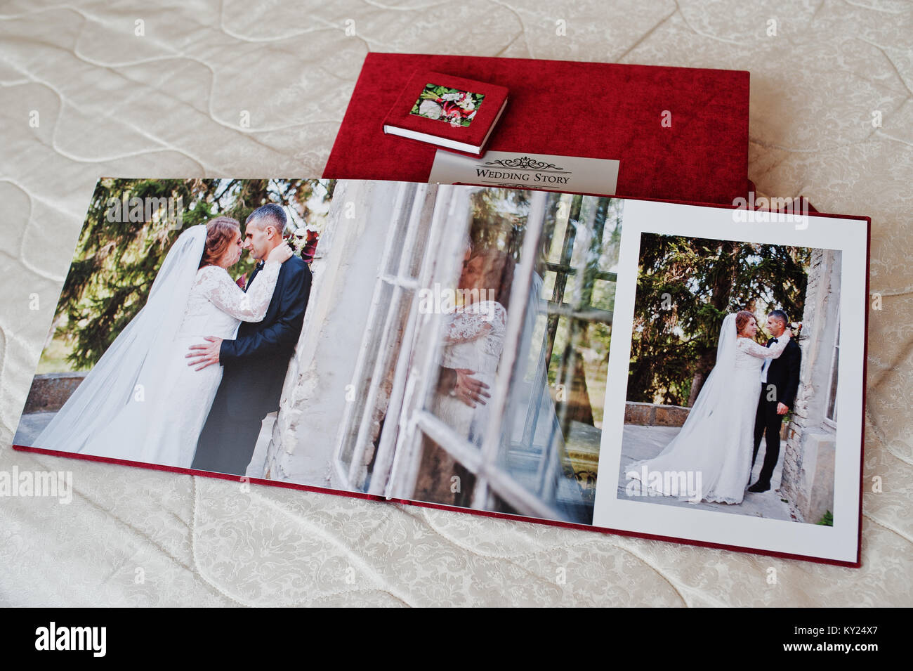 Pages of red wedding photobook or wedding album on white background ...