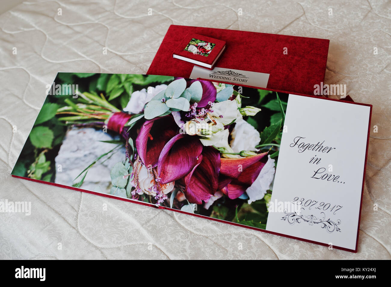 Pages of red wedding photobook or wedding album on white background ...