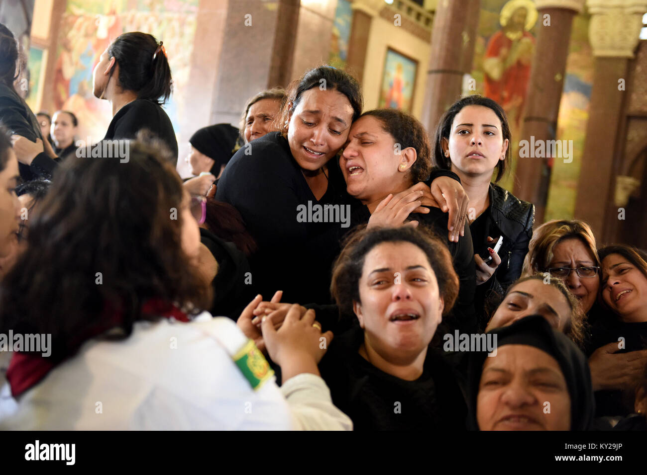 Cry during the funeral hi-res stock photography and images - Alamy