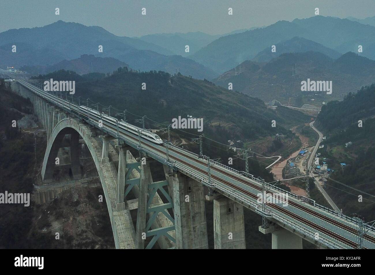 Zunyi, China's Guizhou Province. 11th Jan, 2018. A bullet train runs ...