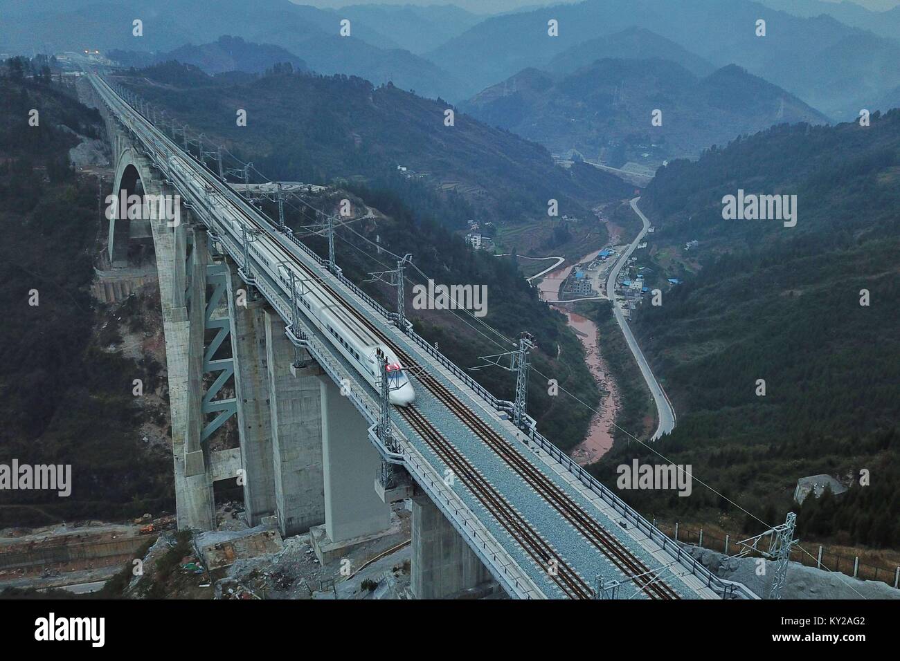 Zunyi, China's Guizhou Province. 11th Jan, 2018. A bullet train runs ...
