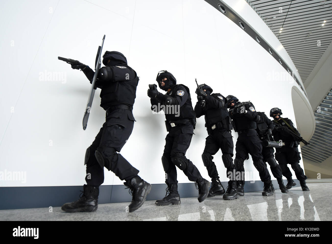 Chongqing. 12th Jan, 2018. Railway police officiers take part in an ...