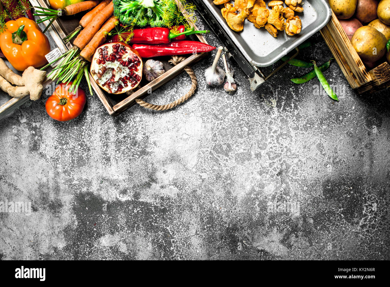 Organic food. Fresh harvest of vegetables and fruits. On a rustic ...