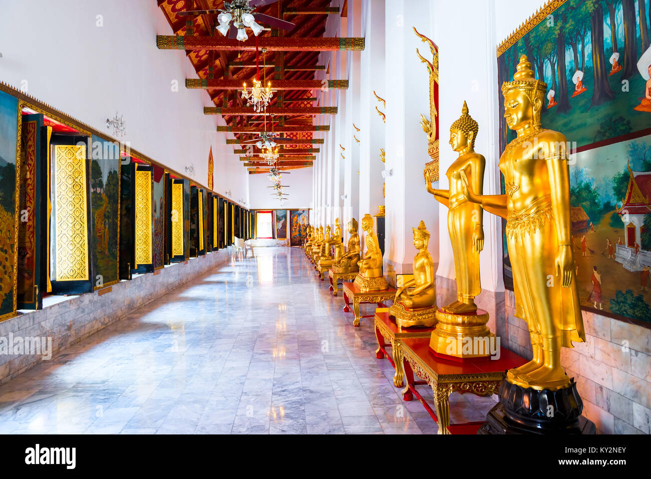 empty beautiful light temple in Bangkok, sitting along the walls of the ...
