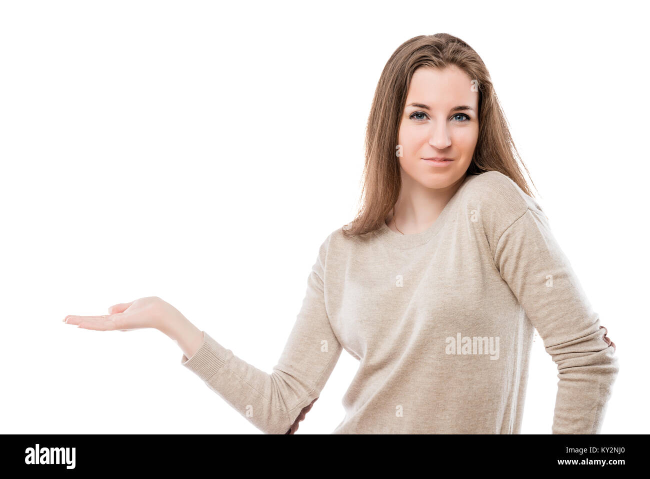 beautiful girl holds a palm on a white background, space on the left ...
