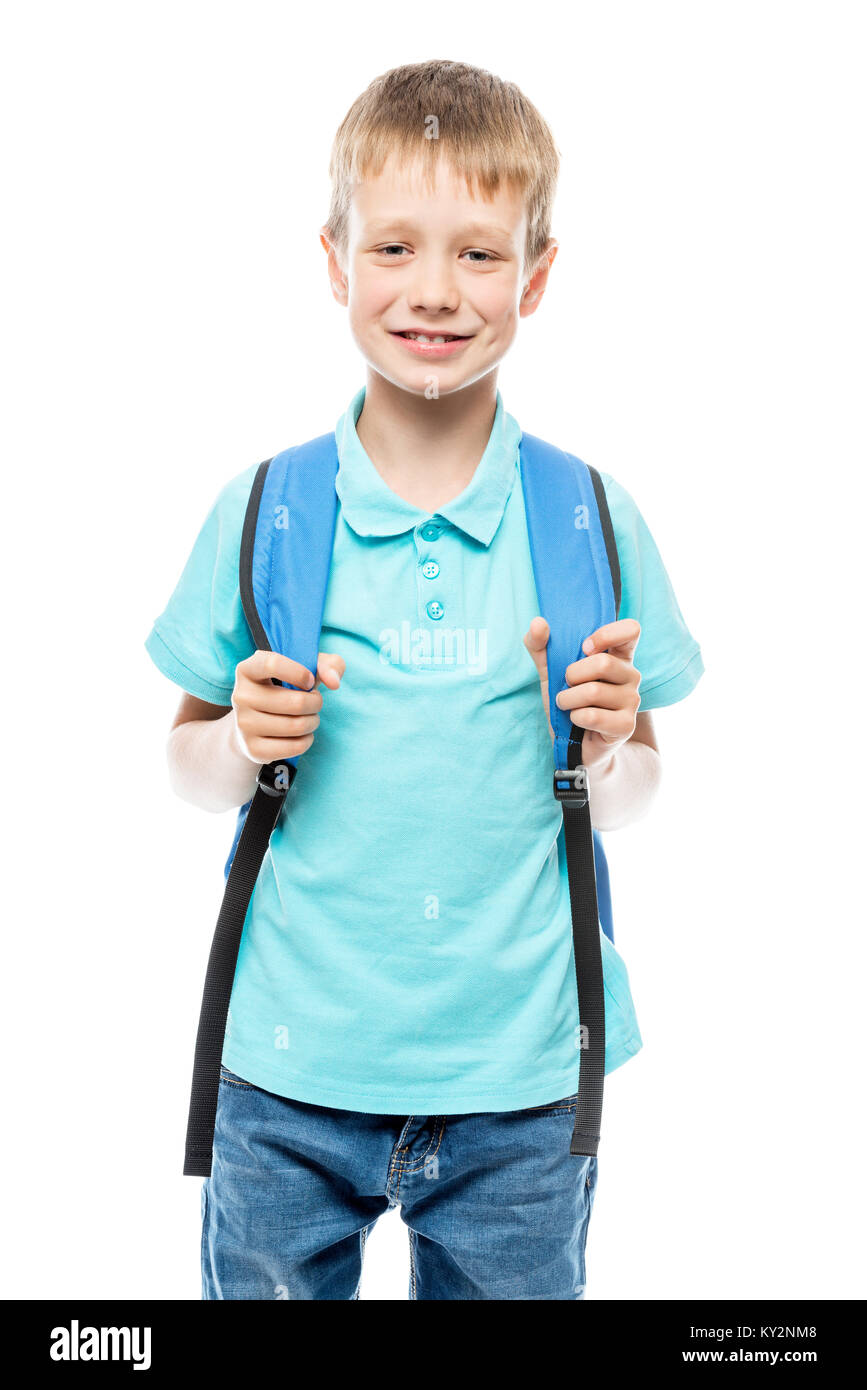 boy with backpack ready to go to school, portrait on white background ...