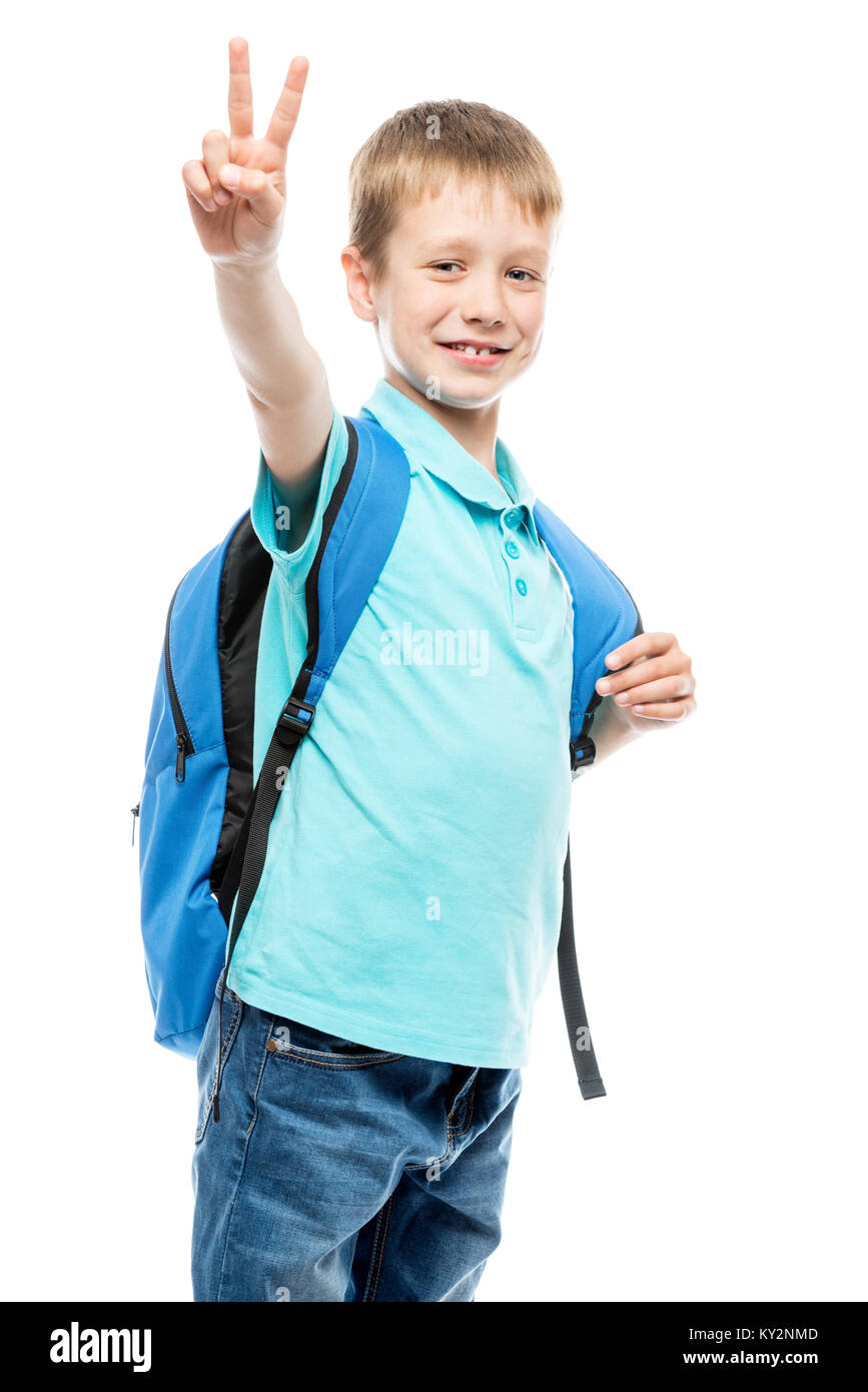 schoolboy with backpack smiling and showing a hand gesture on a white ...