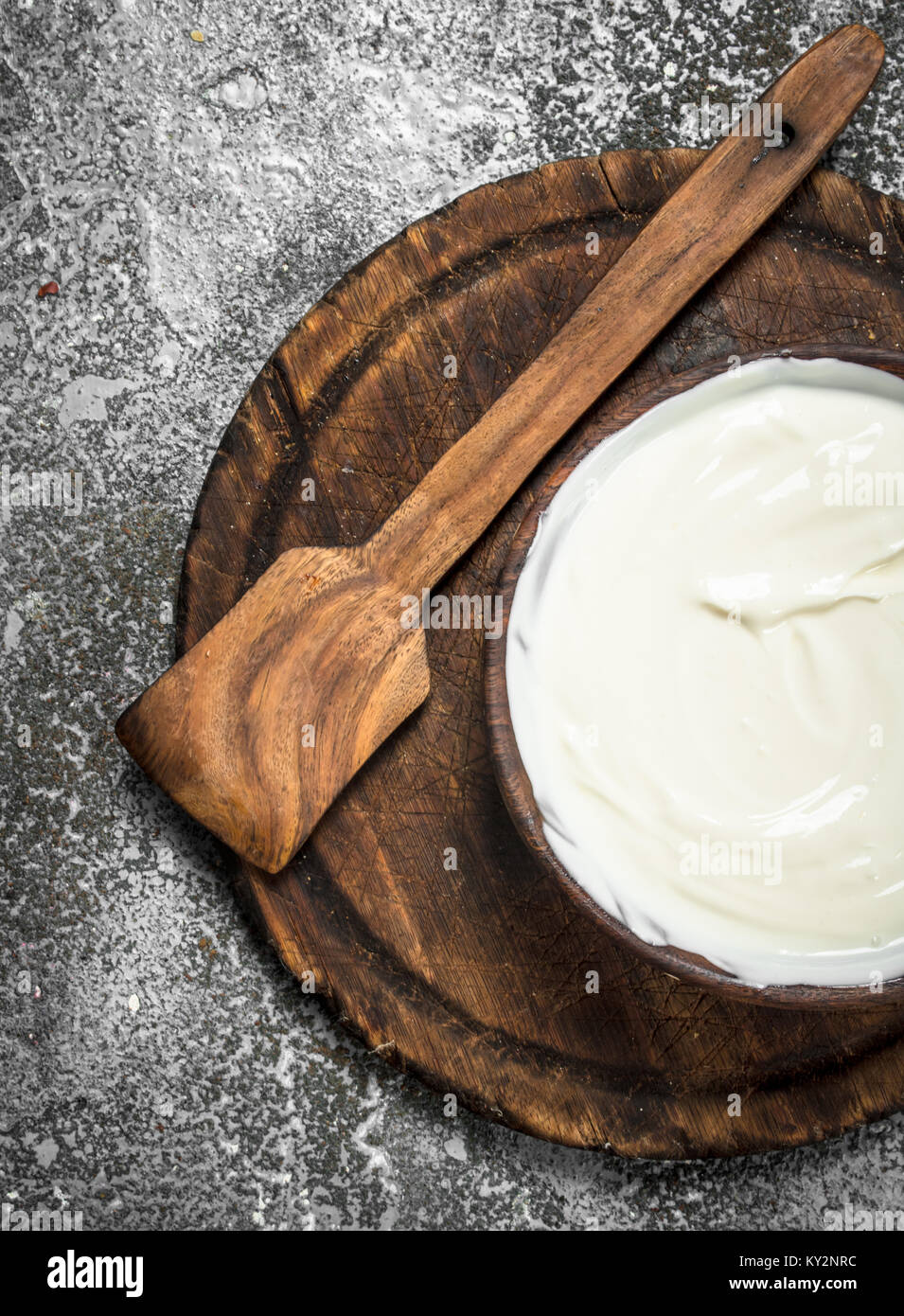 Natural yogurt in a bowl. On a rustic background Stock Photo - Alamy