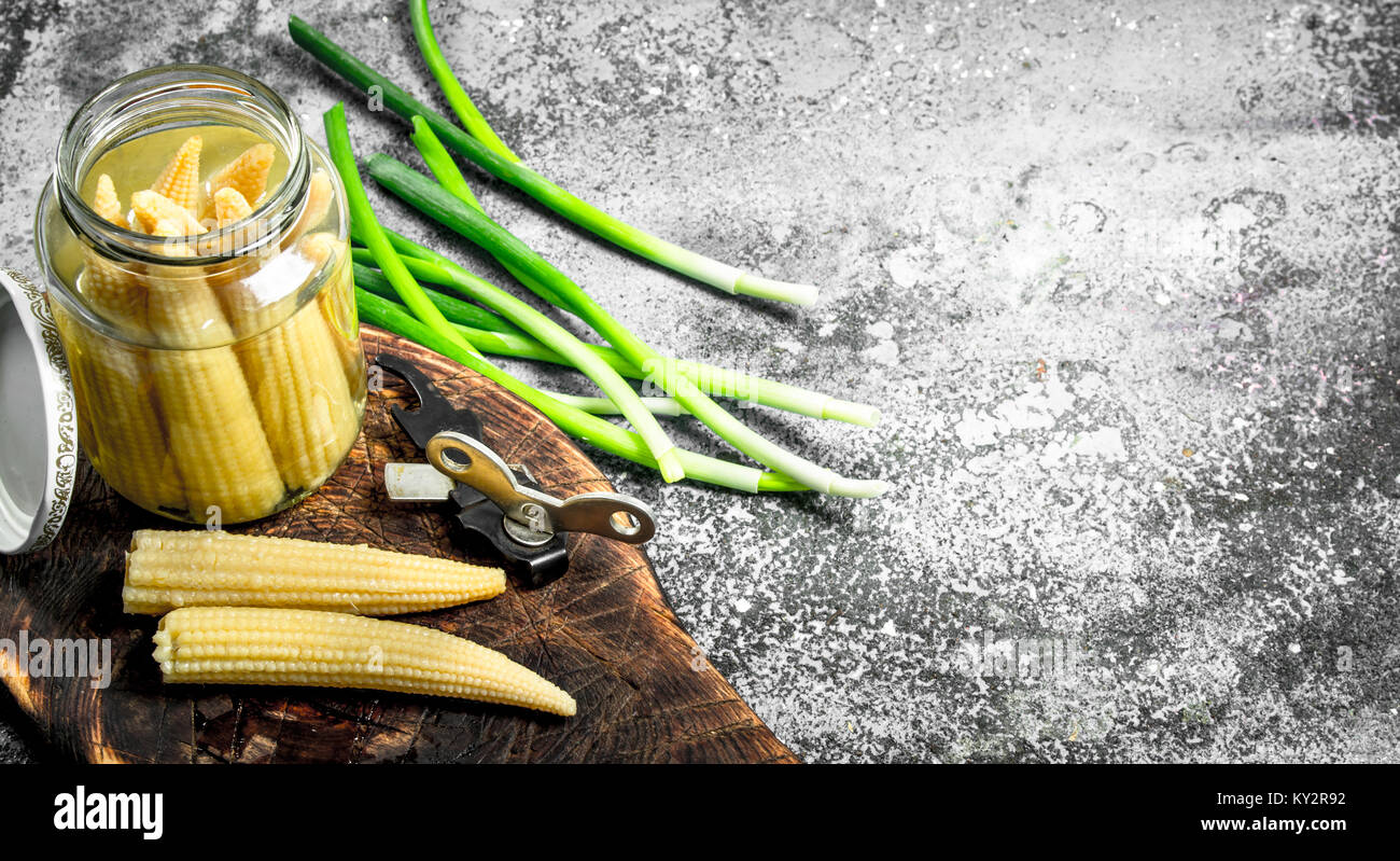 Marinated corn in glass jar. On a rustic background Stock Photo - Alamy