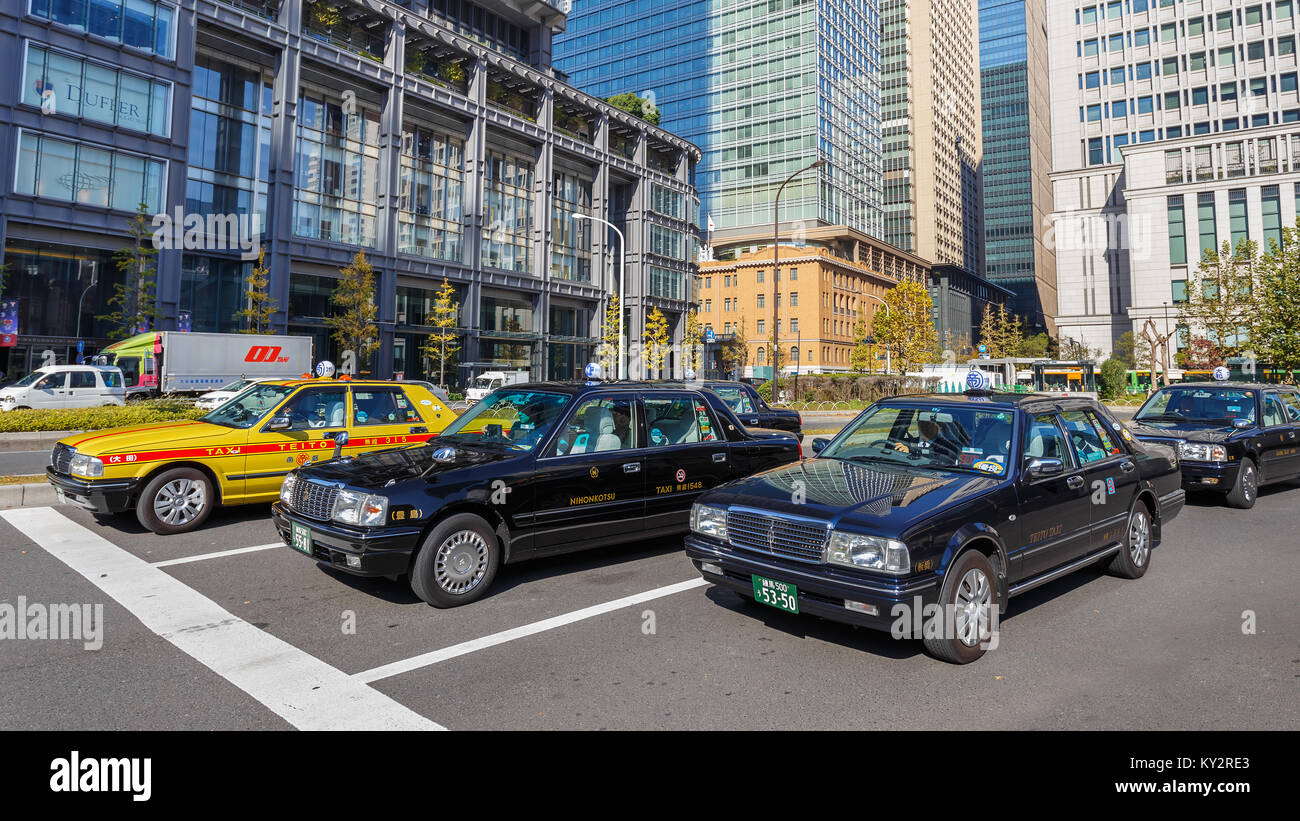 TOKYO, JAPAN - NOVEMBER 26: Taxi in Tokyo, Japan on November 26, 2013 ...