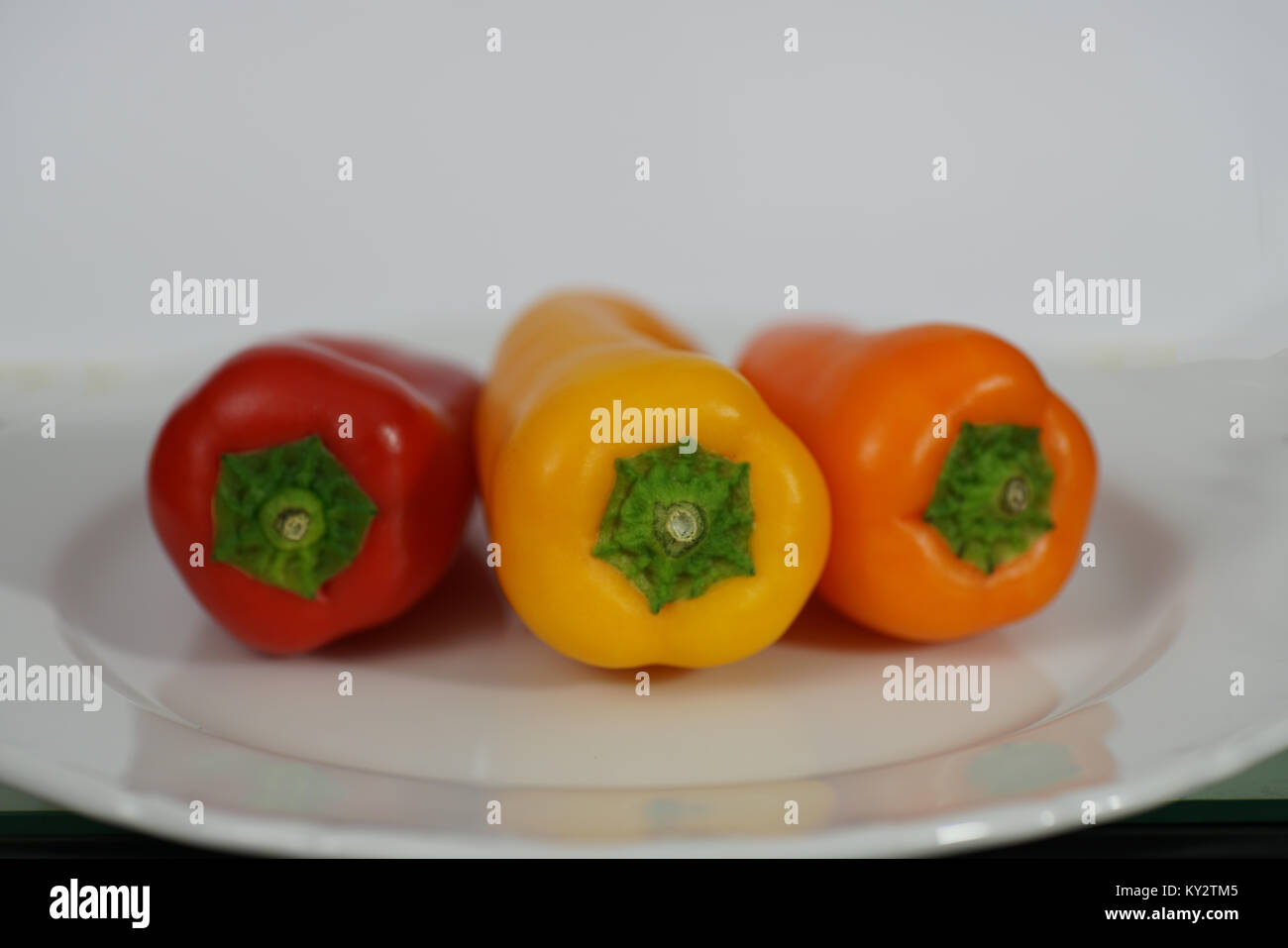 Small peppers in different colors and shapes Stock Photo - Alamy