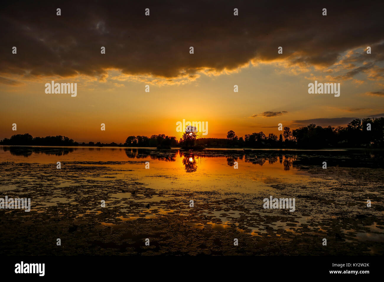 Sunset on lake Stock Photo - Alamy