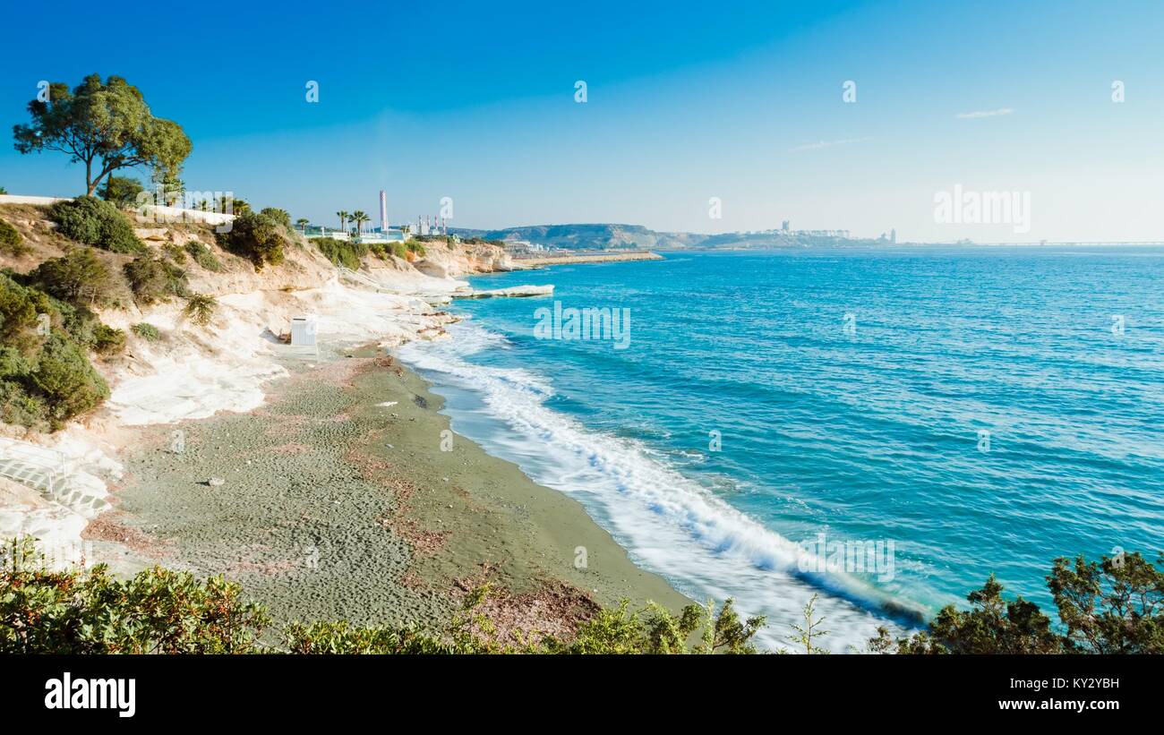 The coastline and landmark big white chalk rock at Governor's beach ...