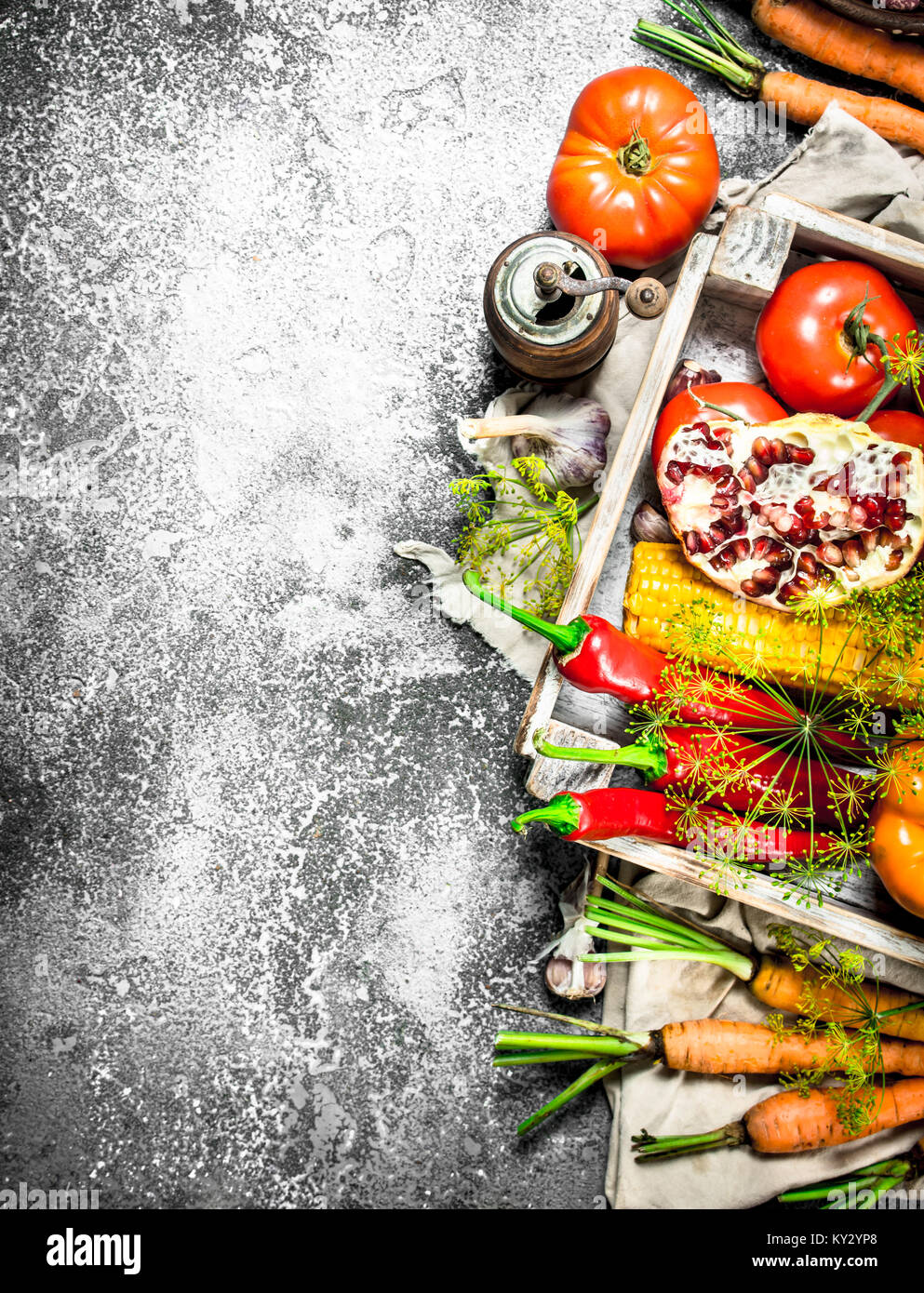 Organic food. Fresh harvest of vegetables and fruits. On a rustic ...