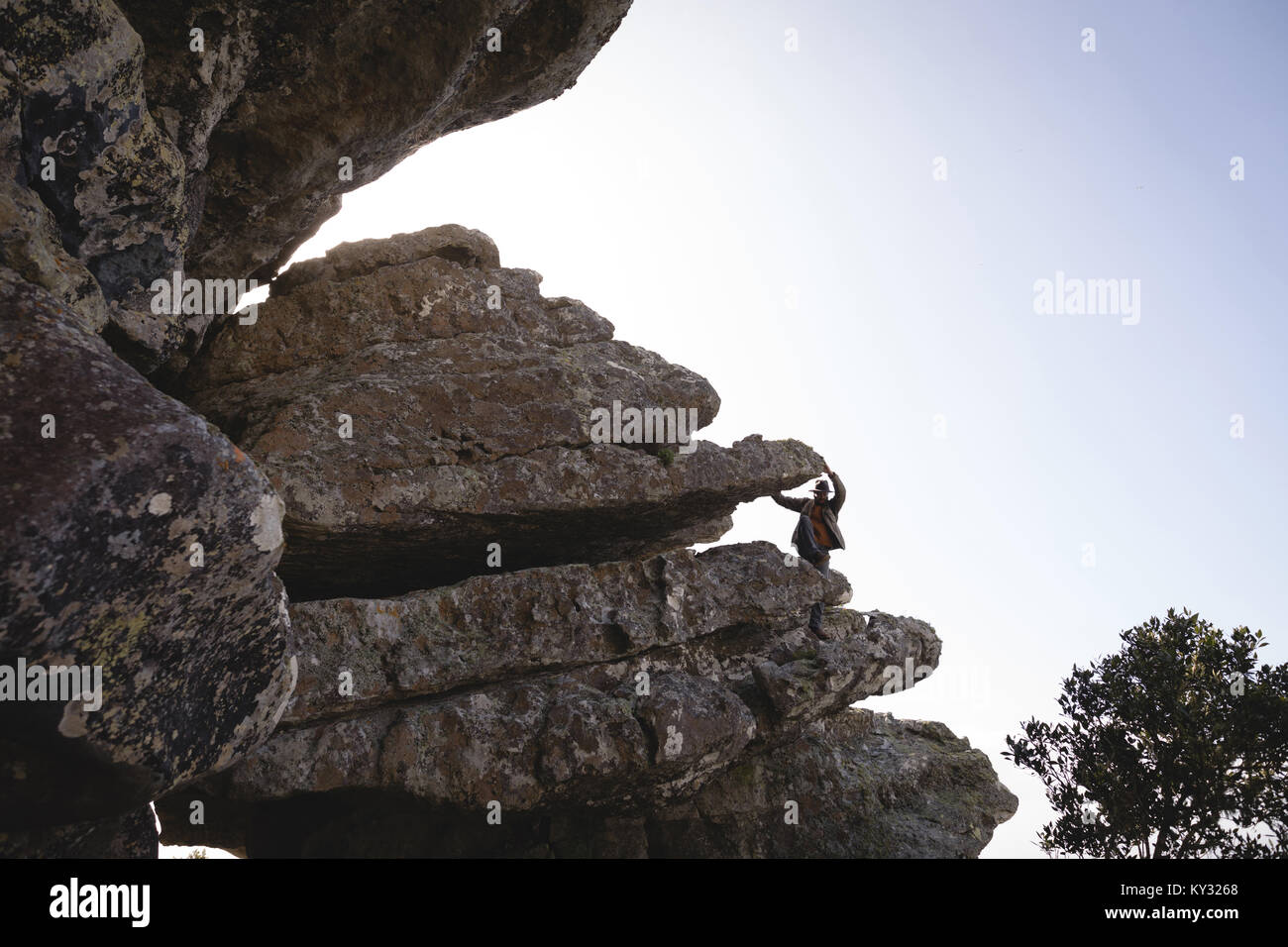 Man walking through rocks hi-res stock photography and images - Alamy