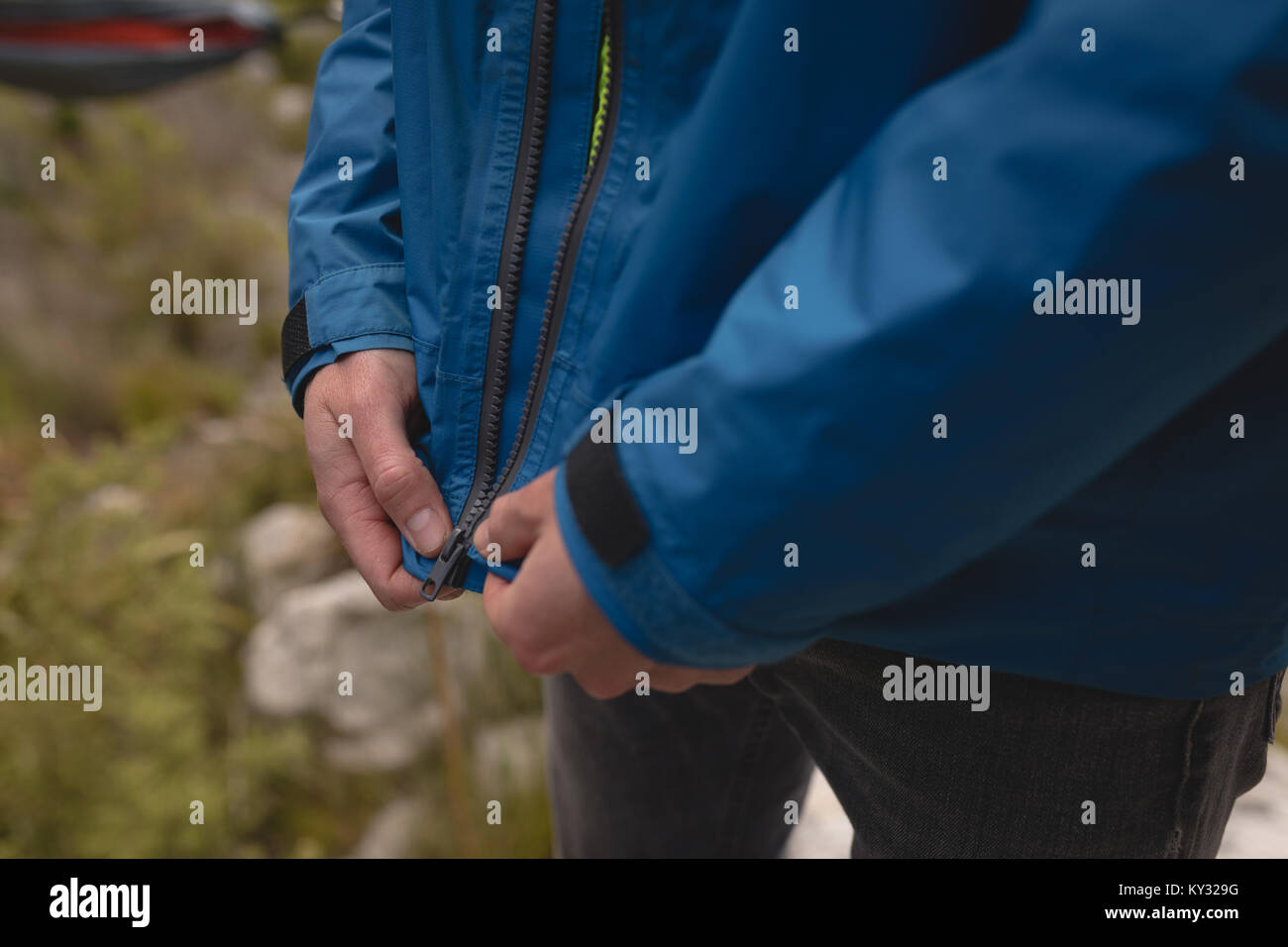 Zipper pulling hi-res stock photography and images - Alamy