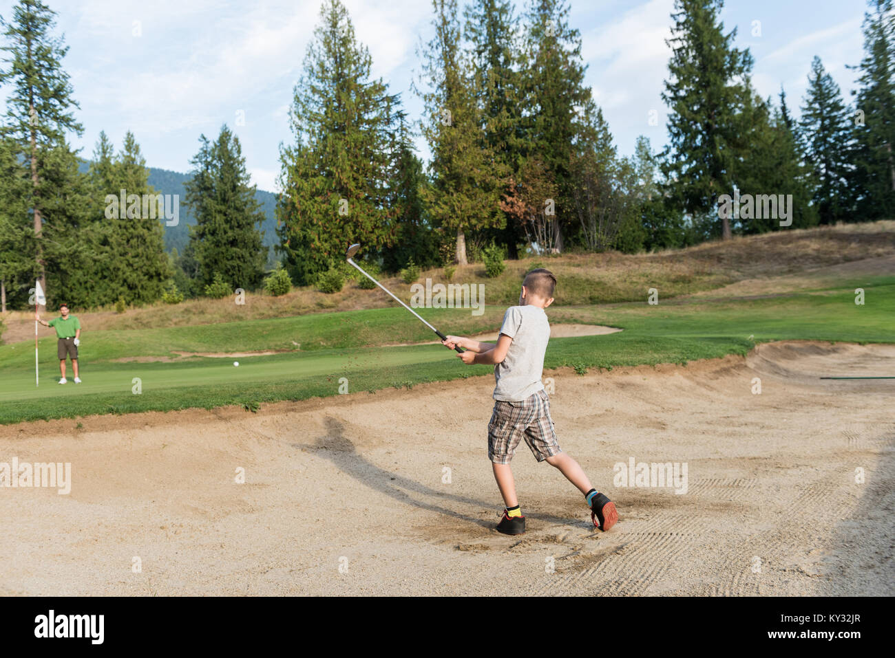 Boy taking a shot Stock Photo - Alamy
