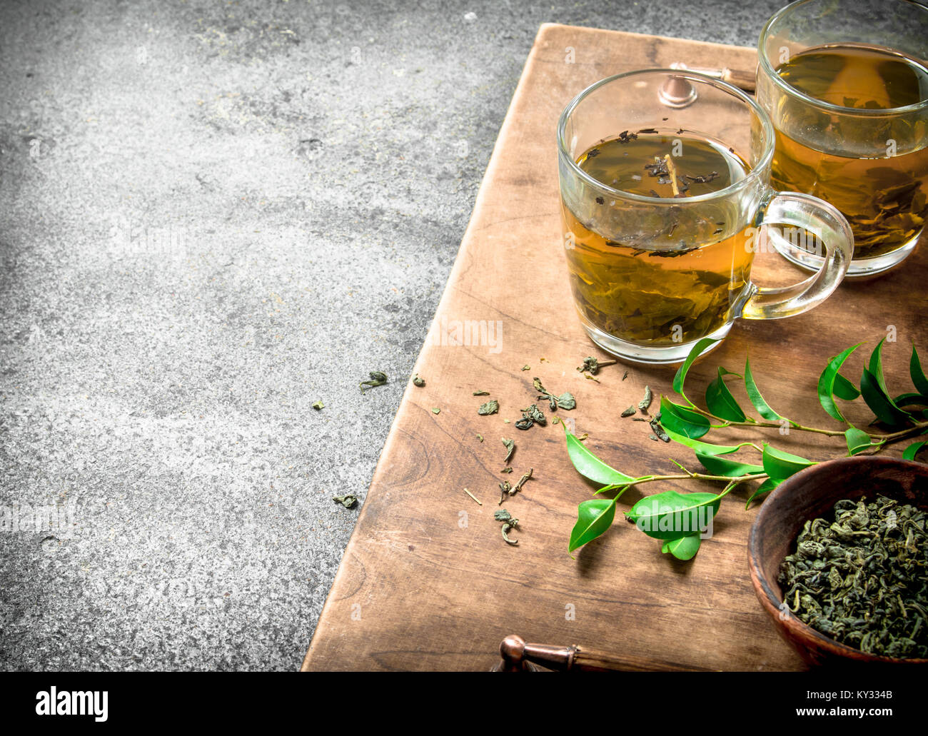 Aromatic Indian tea. On a rustic background Stock Photo - Alamy